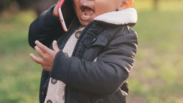 Baby’s Pretend Phone Call Is Just Too Cute - WeHaveKids News